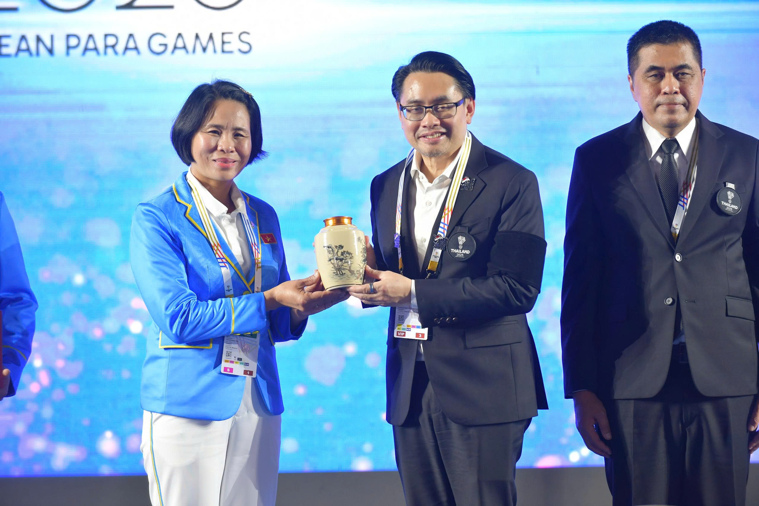 The Vietnamese Paralympic Team attends the flag-raising ceremony at the ...